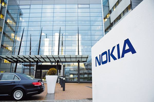 Nokia cuts losses as merger with rival proceeds - The Gulf Time Newspaper